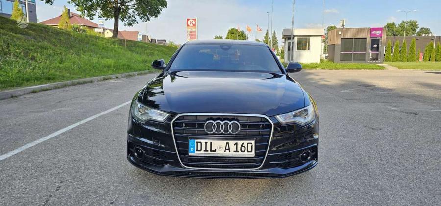 Black Audi A6 2012 in Jonava, with an engine capacity of 2.97 L and mileage of 290 thousand km for 7199 €, photo 5 on AUTOMOTO.COM.LV
