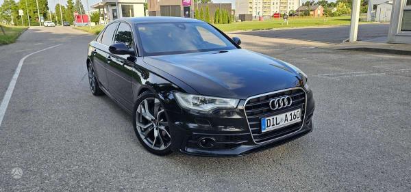 Black Audi A6 2012 in Jonava, with an engine capacity of 2.97 L and mileage of 290 thousand km for 7199 €, photo 5 on AUTOMOTO.COM.LV