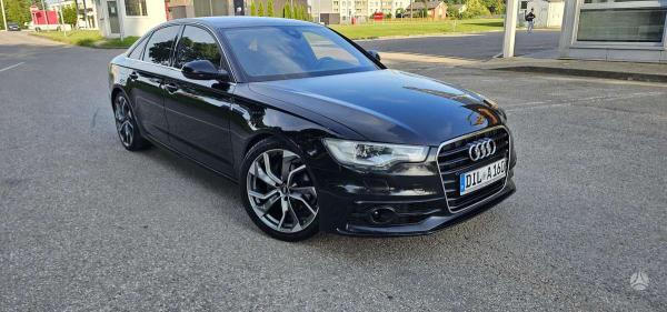 Black Audi A6 2012 in Jonava, with an engine capacity of 2.97 L and mileage of 290 thousand km for 7199 €, photo 6 on AUTOMOTO.COM.LV