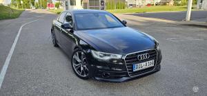 Black Audi A6 2012 in Jonava, with an engine capacity of 2.97 L and mileage of 290 thousand km for 7199 €, photo 8 on AUTOMOTO.COM.LV