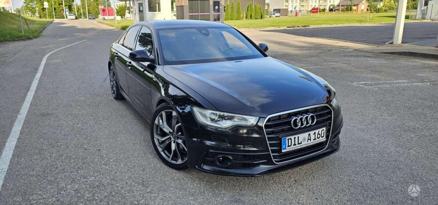 Black Audi A6 2012 in Jonava, with an engine capacity of 2.97 L and mileage of 290 thousand km for 7199 €, photo 8 on AUTOMOTO.COM.LV