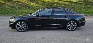 Black Audi A6 2012 in Jonava, with an engine capacity of 2.97 L and mileage of 290 thousand km for 7199 €, photo 9 on AUTOMOTO.COM.LV