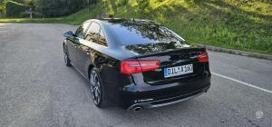 Black Audi A6 2012 in Jonava, with an engine capacity of 2.97 L and mileage of 290 thousand km for 7199 €, photo 12 on AUTOMOTO.COM.LV