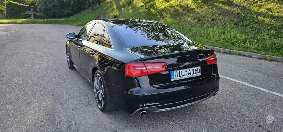 Black Audi A6 2012 in Jonava, with an engine capacity of 2.97 L and mileage of 290 thousand km for 7199 €, photo 12 on AUTOMOTO.COM.LV