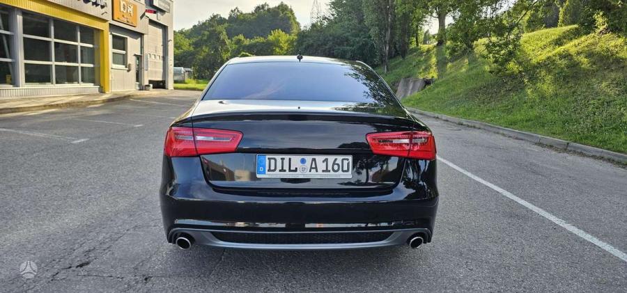 Black Audi A6 2012 in Jonava, with an engine capacity of 2.97 L and mileage of 290 thousand km for 7199 €, photo 13 on AUTOMOTO.COM.LV