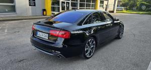 Black Audi A6 2012 in Jonava, with an engine capacity of 2.97 L and mileage of 290 thousand km for 7199 €, photo 14 on AUTOMOTO.COM.LV
