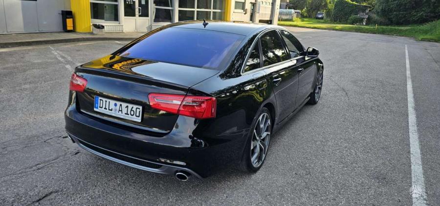 Black Audi A6 2012 in Jonava, with an engine capacity of 2.97 L and mileage of 290 thousand km for 7199 €, photo 15 on AUTOMOTO.COM.LV
