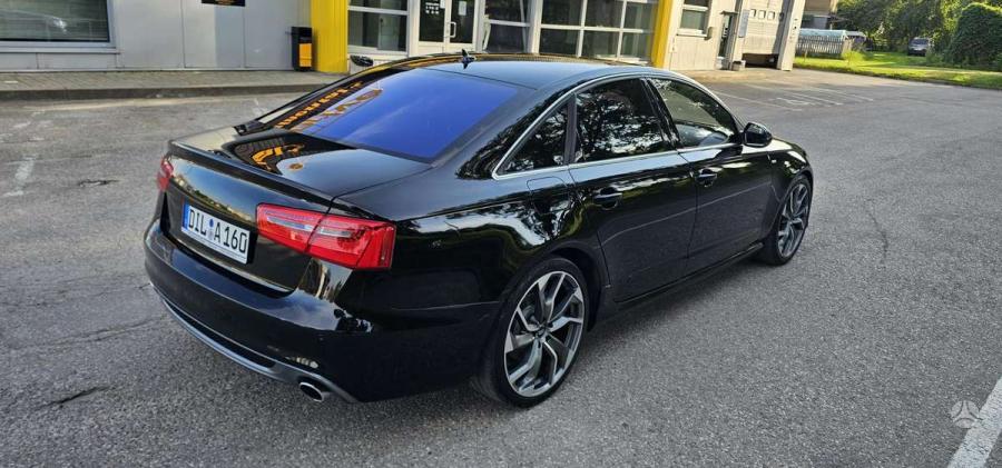 Black Audi A6 2012 in Jonava, with an engine capacity of 2.97 L and mileage of 290 thousand km for 7199 €, photo 16 on AUTOMOTO.COM.LV
