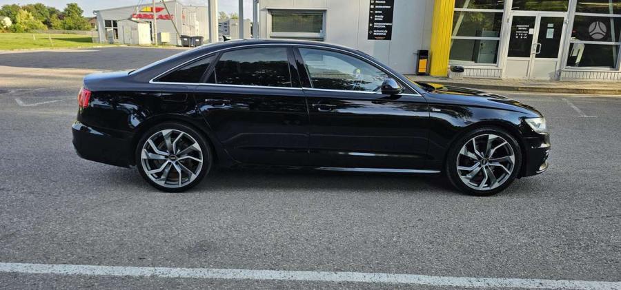 Black Audi A6 2012 in Jonava, with an engine capacity of 2.97 L and mileage of 290 thousand km for 7199 €, photo 17 on AUTOMOTO.COM.LV