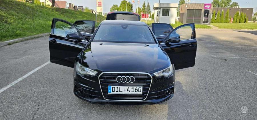 Black Audi A6 2012 in Jonava, with an engine capacity of 2.97 L and mileage of 290 thousand km for 7199 €, photo 18 on AUTOMOTO.COM.LV