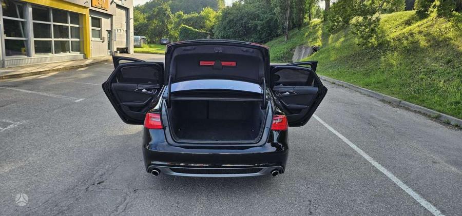 Black Audi A6 2012 in Jonava, with an engine capacity of 2.97 L and mileage of 290 thousand km for 7199 €, photo 19 on AUTOMOTO.COM.LV