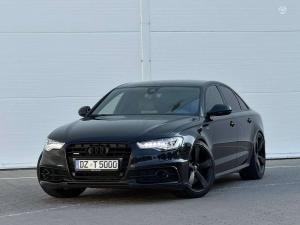 Melns Audi A6 2012 Rīga, ar dzinēja tilpumu 2.97 L un nobraukumu 283 tūkst. km par 11500 €, foto  vietnē AUTOMOTO.COM.LV