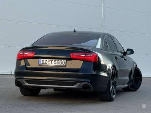 Black Audi A6 2012 in Riga, with an engine capacity of 2.97 L and mileage of 283 thousand km for 11500 €, photo 3 on AUTOMOTO.COM.LV