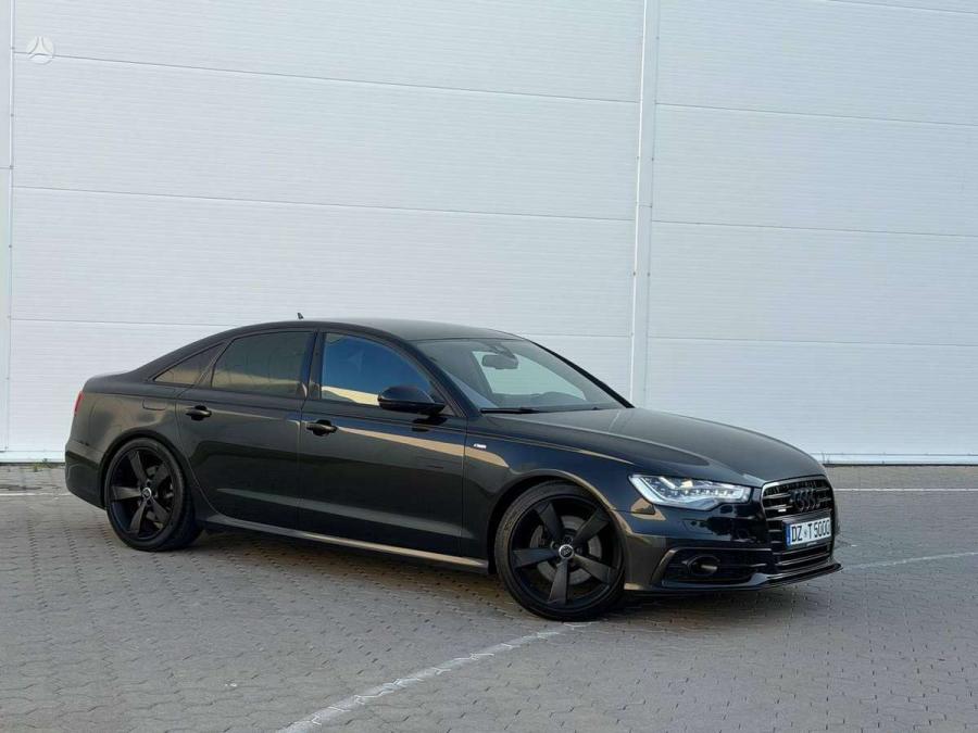 Black Audi A6 2012 in Riga, with an engine capacity of 2.97 L and mileage of 283 thousand km for 11500 €, photo 6 on AUTOMOTO.COM.LV