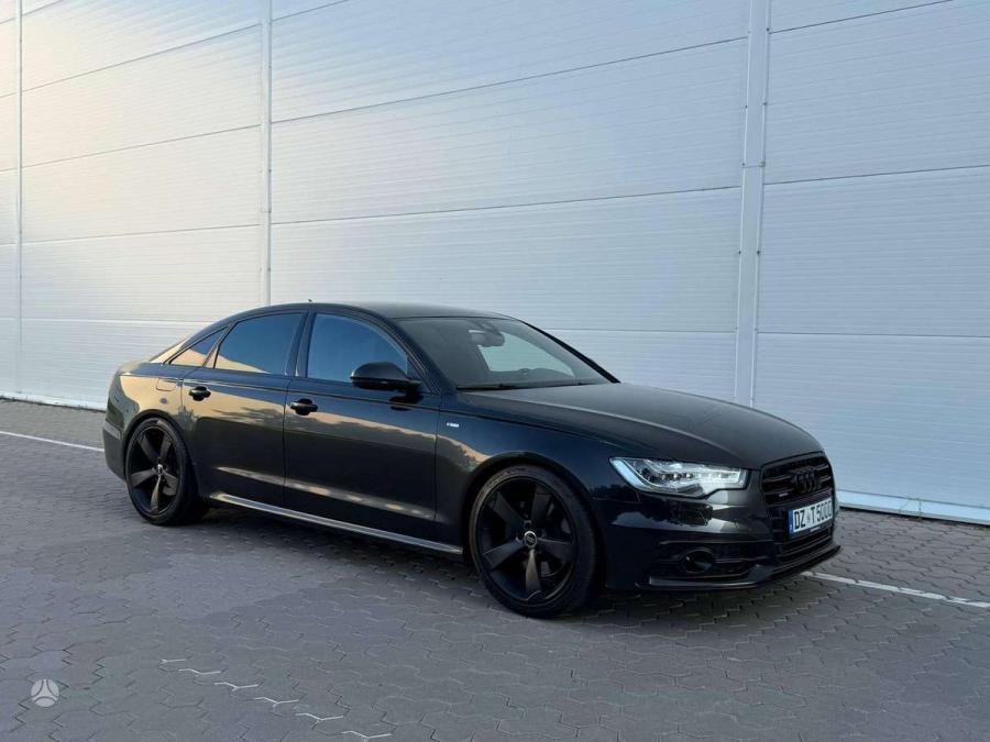 Black Audi A6 2012 in Riga, with an engine capacity of 2.97 L and mileage of 283 thousand km for 11500 €, photo 13 on AUTOMOTO.COM.LV