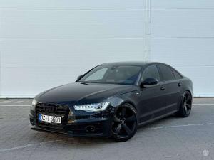 Black Audi A6 2012 in Riga, with an engine capacity of 2.97 L and mileage of 283 thousand km for 11500 €, photo 14 on AUTOMOTO.COM.LV