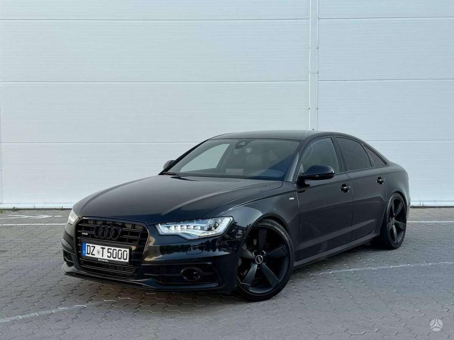 Black Audi A6 2012 in Riga, with an engine capacity of 2.97 L and mileage of 283 thousand km for 11500 €, photo 14 on AUTOMOTO.COM.LV