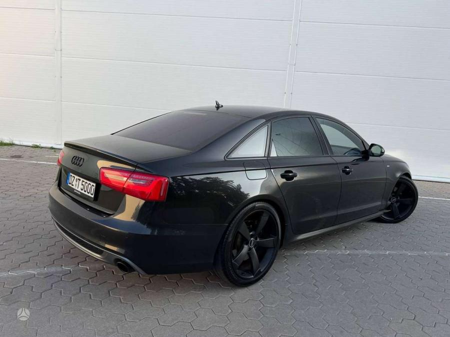 Black Audi A6 2012 in Riga, with an engine capacity of 2.97 L and mileage of 283 thousand km for 11500 €, photo 15 on AUTOMOTO.COM.LV