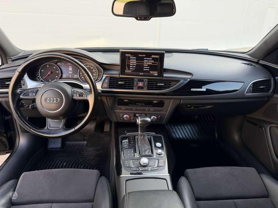 Black Audi A6 2012 in Riga, with an engine capacity of 2.97 L and mileage of 283 thousand km for 11500 €, photo 23 on AUTOMOTO.COM.LV