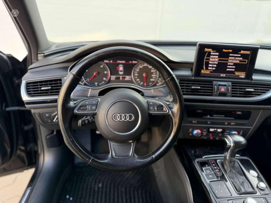 Black Audi A6 2012 in Riga, with an engine capacity of 2.97 L and mileage of 283 thousand km for 11500 €, photo 24 on AUTOMOTO.COM.LV