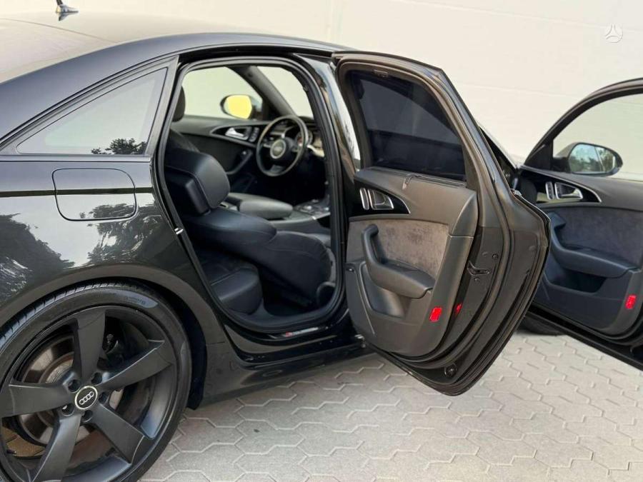 Black Audi A6 2012 in Riga, with an engine capacity of 2.97 L and mileage of 283 thousand km for 11500 €, photo 28 on AUTOMOTO.COM.LV