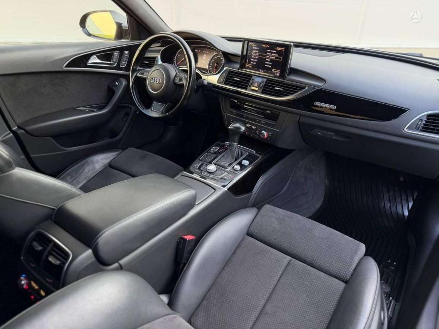 Black Audi A6 2012 in Riga, with an engine capacity of 2.97 L and mileage of 283 thousand km for 11500 €, photo 31 on AUTOMOTO.COM.LV