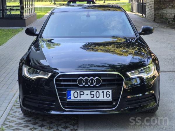 Melns Audi A6 2012 Rīga, ar dzinēja tilpumu 2.00 L un nobraukumu 340 tūkst. km par 9000 €, foto 10 vietnē AUTOMOTO.COM.LV