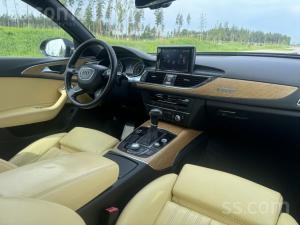 Black Audi A6 2012 in Valmiera, with an engine capacity of 3.00 L and mileage of 320 thousand km for 9850 €, photo 13 on AUTOMOTO.COM.LV