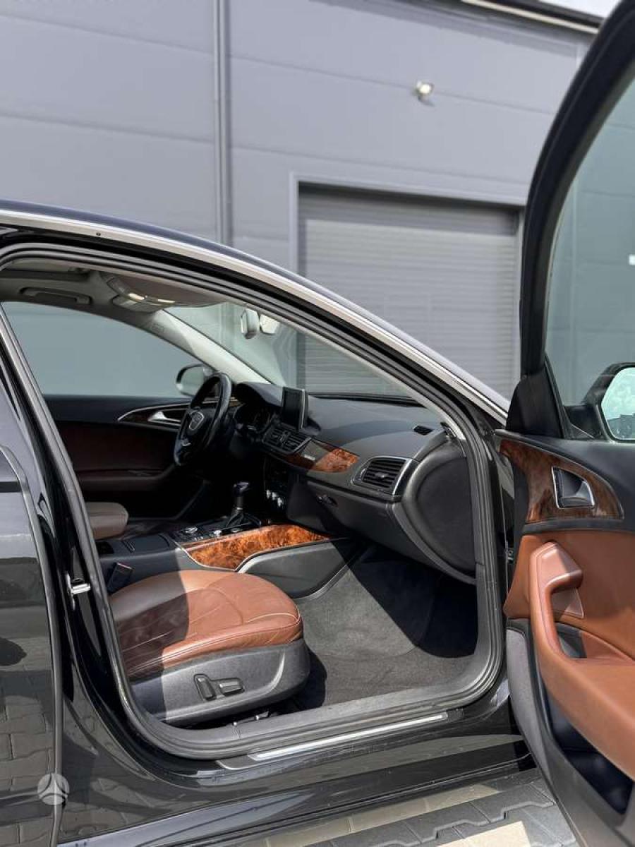 Black Audi A6 2012 in Klaipeda, with an engine capacity of 3.00 L and mileage of 178 thousand km for 10300 €, photo 14 on AUTOMOTO.COM.LV