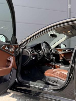 Black Audi A6 2012 in Klaipeda, with an engine capacity of 3.00 L and mileage of 178 thousand km for 10300 €, photo 18 on AUTOMOTO.COM.LV