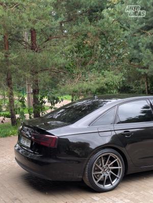 Black Audi A6 2012 in Kaunas, with an engine capacity of 2.00 L and mileage of 325 thousand km for 11200 €, photo 5 on AUTOMOTO.COM.LV