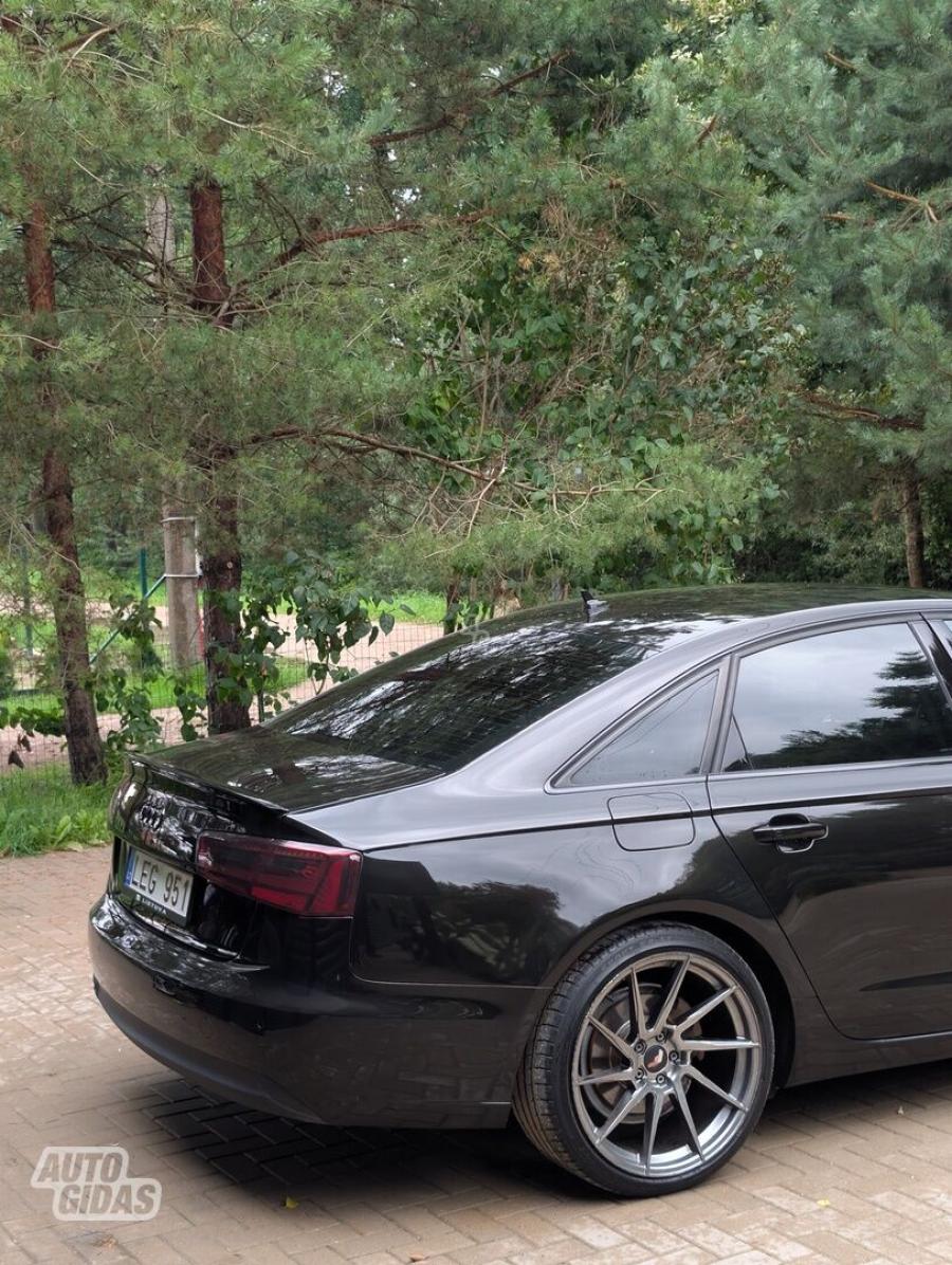 Black Audi A6 2012 in Kaunas, with an engine capacity of 2.00 L and mileage of 325 thousand km for 11200 €, photo 6 on AUTOMOTO.COM.LV