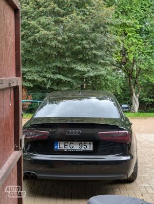 Black Audi A6 2012 in Kaunas, with an engine capacity of 2.00 L and mileage of 325 thousand km for 11200 €, photo 7 on AUTOMOTO.COM.LV