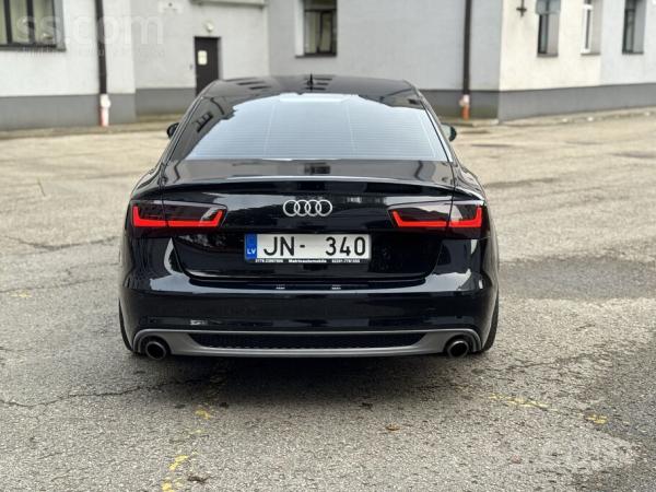Ауди А6 2012 в Елгава на AUTOMOTO.COM.LV Черный Ауди А6 2012 в Елгава, объемом двигателя 3.00 л и пробегом 365 тыс. км за 12300 €, фото 6 на AUTOMOTO.COM.LV