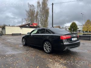 Black Audi A6 2013 in Riga, with an engine capacity of 2.80 L and mileage of 140 thousand km for 14000 €, photo 3 on AUTOMOTO.COM.LV