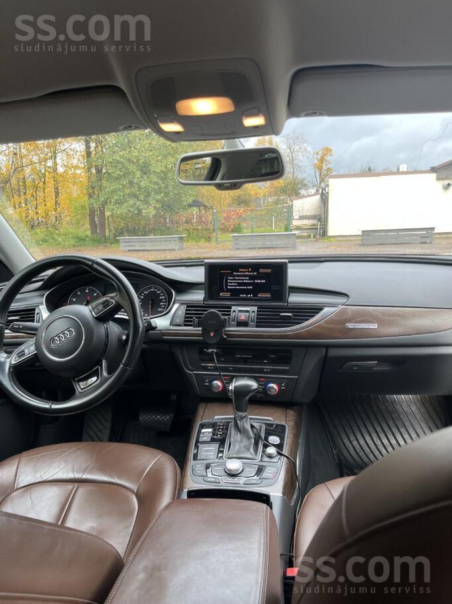 Black Audi A6 2013 in Riga, with an engine capacity of 2.80 L and mileage of 140 thousand km for 14000 €, photo 5 on AUTOMOTO.COM.LV