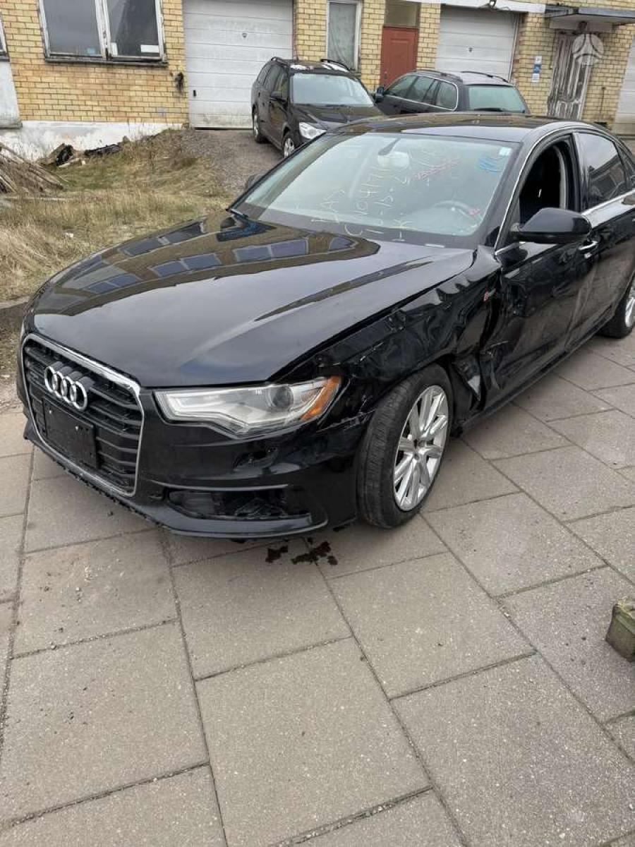 Black Audi A6 2013 in Panevezys, with an engine capacity of 3.00 L and mileage of 318 thousand km for 4700 €, photo 2 on AUTOMOTO.COM.LV