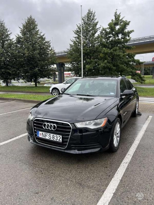 Black Audi A6 2013 in Klaipeda, with an engine capacity of 2.00 L and mileage of 237 thousand km for 9400 €, photo 2 on AUTOMOTO.COM.LV