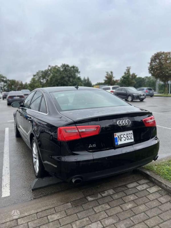 Black Audi A6 2013 in Klaipeda, with an engine capacity of 2.00 L and mileage of 237 thousand km for 9400 €, photo 4 on AUTOMOTO.COM.LV