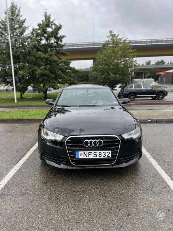 Black Audi A6 2013 in Klaipeda, with an engine capacity of 2.00 L and mileage of 237 thousand km for 9400 €, photo 5 on AUTOMOTO.COM.LV