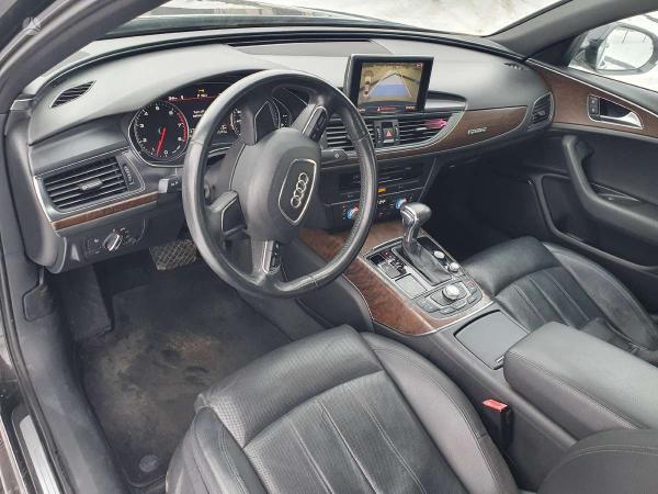 Black Audi A6 2013 in Siauliai, with an engine capacity of 3.00 L and mileage of 241 thousand km for 6350 €, photo 8 on AUTOMOTO.COM.LV