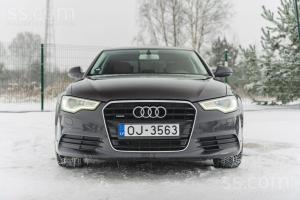 Black Audi A6 2013 in Riga, with an engine capacity of 3.00 L and mileage of 422 thousand km for 13790 €, photo 2 on AUTOMOTO.COM.LV