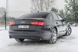 Black Audi A6 2013 in Riga, with an engine capacity of 3.00 L and mileage of 422 thousand km for 13790 €, photo 6 on AUTOMOTO.COM.LV