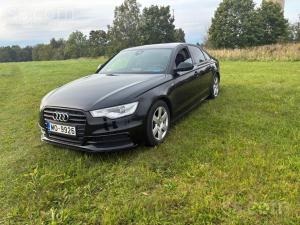 Black Audi A6 2013 in Riga, with an engine capacity of 2.00 L and mileage of 360 thousand km for 9200 €, photo  on AUTOMOTO.COM.LV