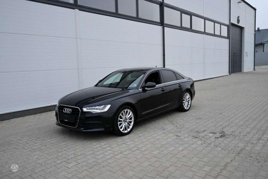 Black Audi A6 2013 in Kretinga, with an engine capacity of 2.97 L and mileage of 210 thousand km for 11499 €, photo 14 on AUTOMOTO.COM.LV
