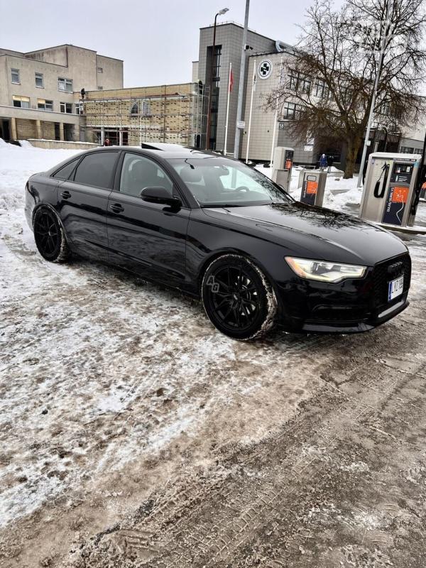 Black Audi A6 2013 in Siauliai, with an engine capacity of 2.00 L and mileage of 193 thousand km for 9500 €, photo 4 on AUTOMOTO.COM.LV