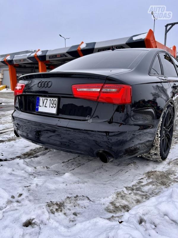 Black Audi A6 2013 in Siauliai, with an engine capacity of 2.00 L and mileage of 193 thousand km for 9500 €, photo 6 on AUTOMOTO.COM.LV