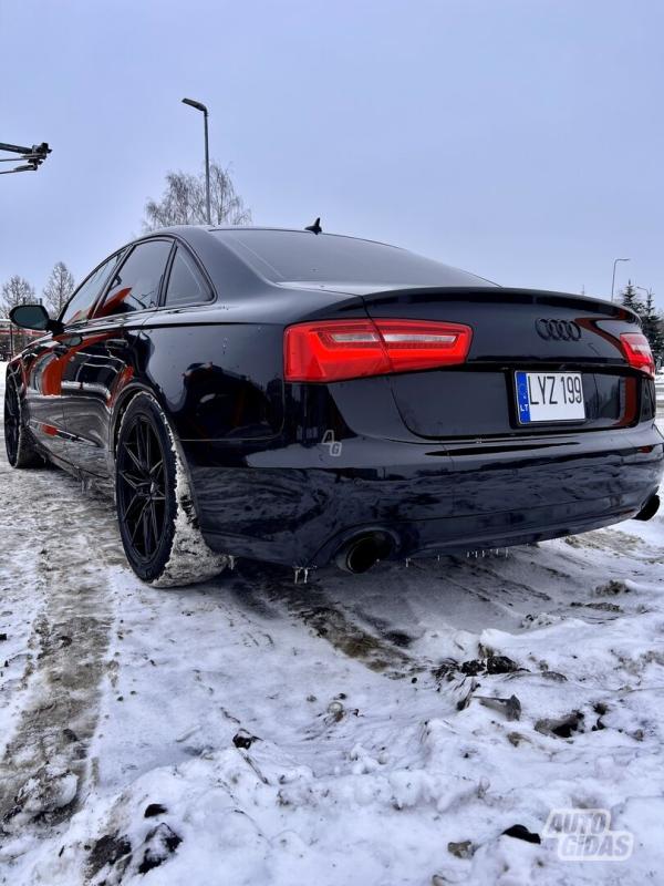 Black Audi A6 2013 in Siauliai, with an engine capacity of 2.00 L and mileage of 193 thousand km for 9500 €, photo 7 on AUTOMOTO.COM.LV
