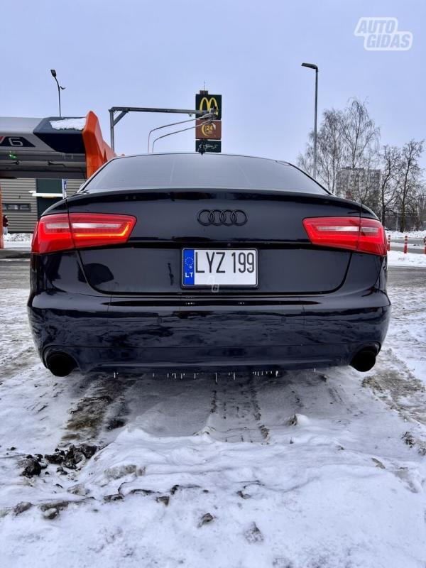 Black Audi A6 2013 in Siauliai, with an engine capacity of 2.00 L and mileage of 193 thousand km for 9500 €, photo 8 on AUTOMOTO.COM.LV