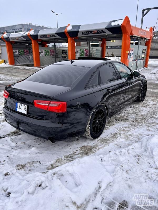 Black Audi A6 2013 in Siauliai, with an engine capacity of 2.00 L and mileage of 193 thousand km for 9500 €, photo 9 on AUTOMOTO.COM.LV